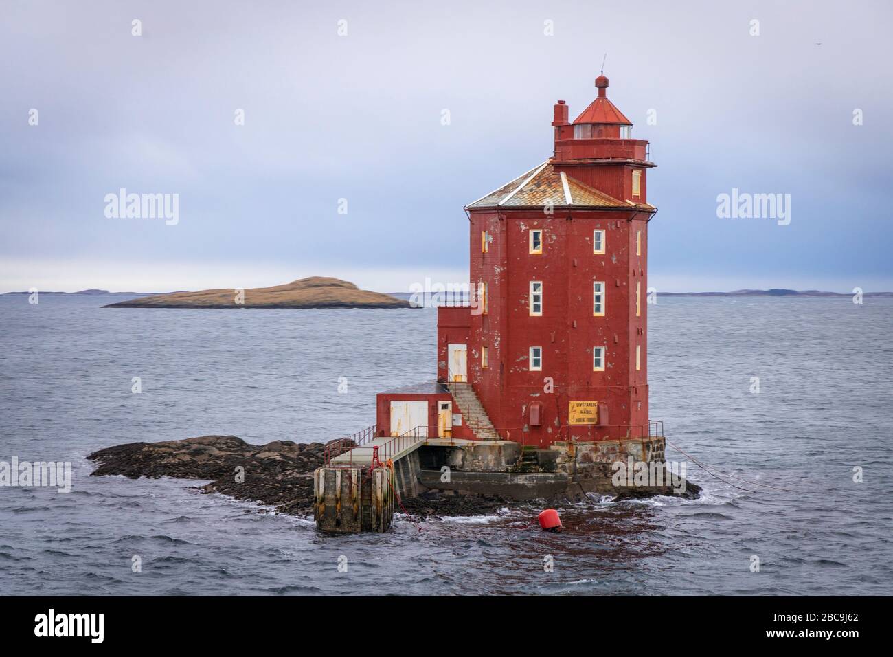 Very old octagon lighthouse Kjeungskjær Fyr in the Norwegian Sea Stock ...