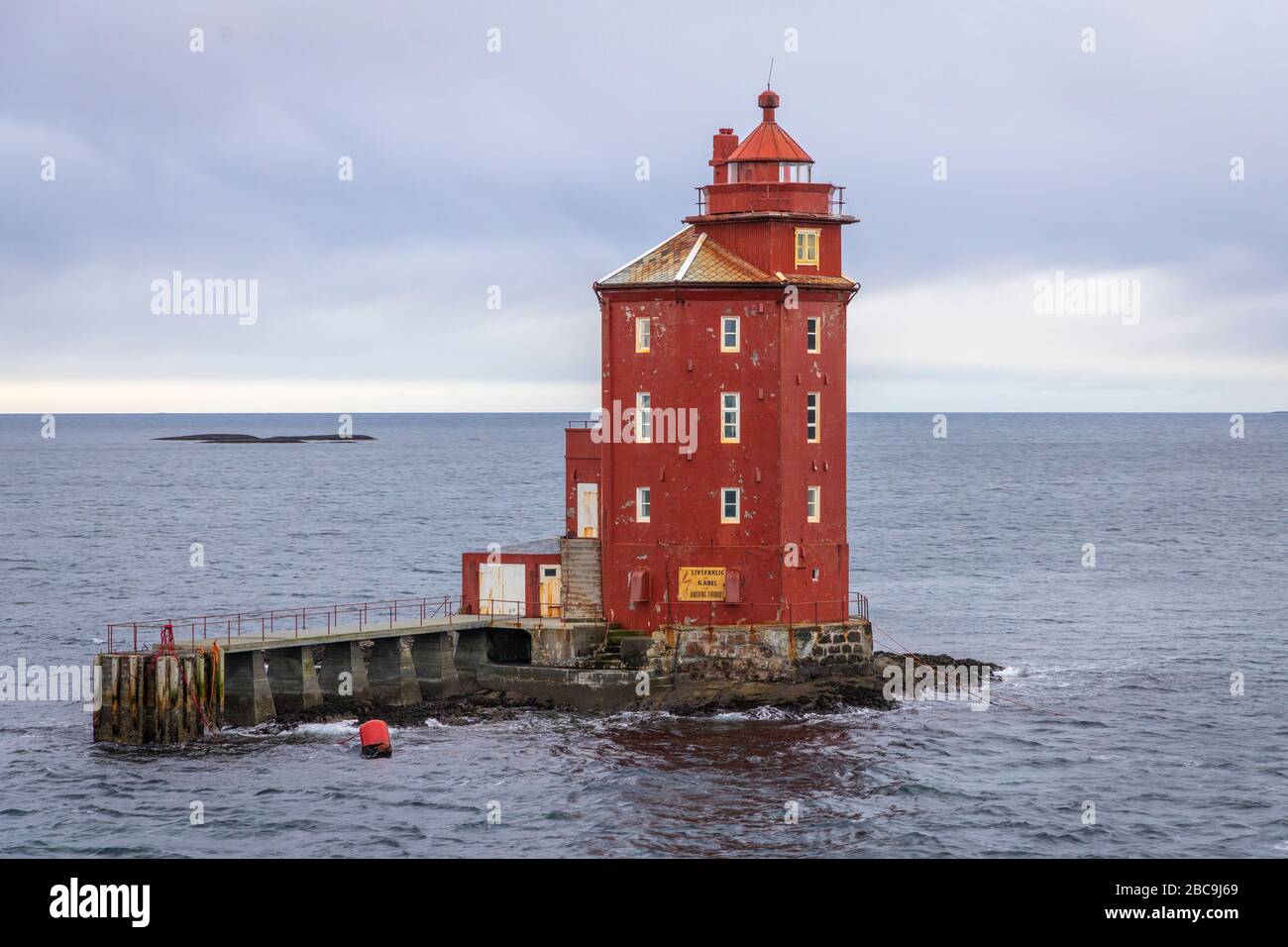 Very old octagon lighthouse Kjeungskjær Fyr in the Norwegian Sea Stock ...