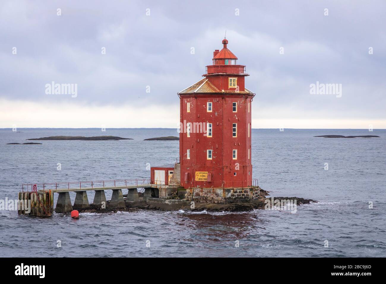 Very old octagon lighthouse Kjeungskjær Fyr in the Norwegian Sea Stock ...