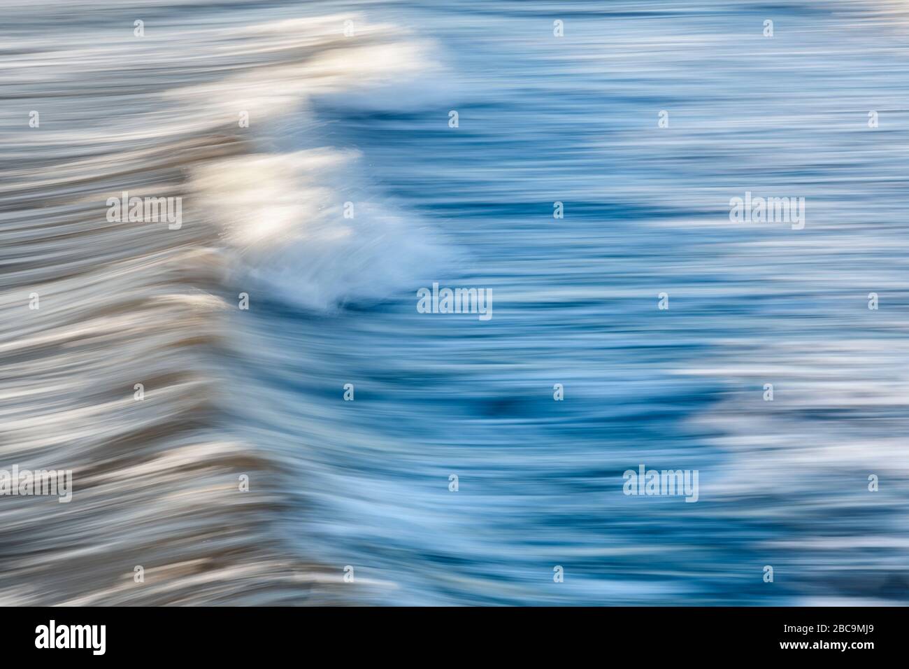 Long exposure of a sunlit ocean wave, Adriatic Sea, Italy Stock Photo ...