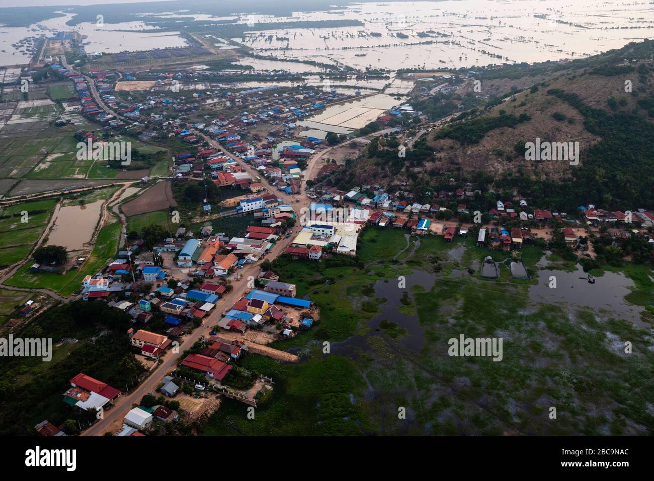 Aerial view of the village of Phnom Krom, south of Siem Reap, Cambodia ...