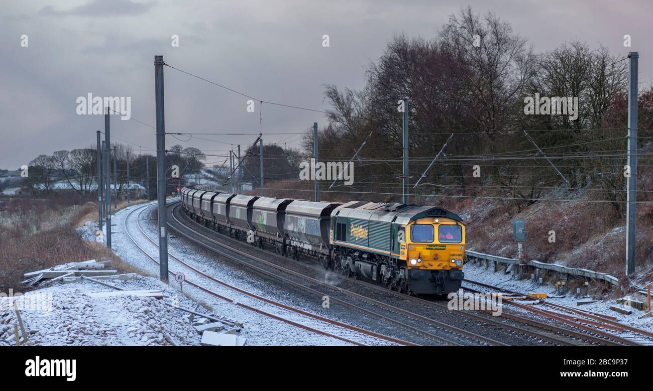 Freightliner class 66 locomotive 66569 hauling an empty coal train on ...