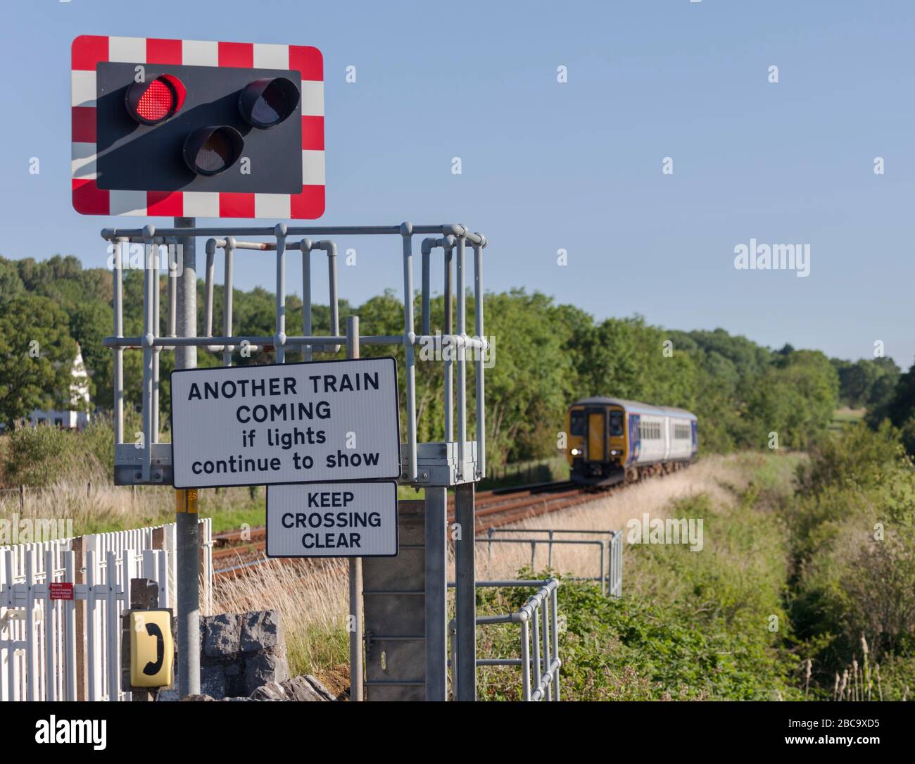 Train approaching the automatic half barrier level crossing at ... Train approaching the automatic half barrier level crossing at ...