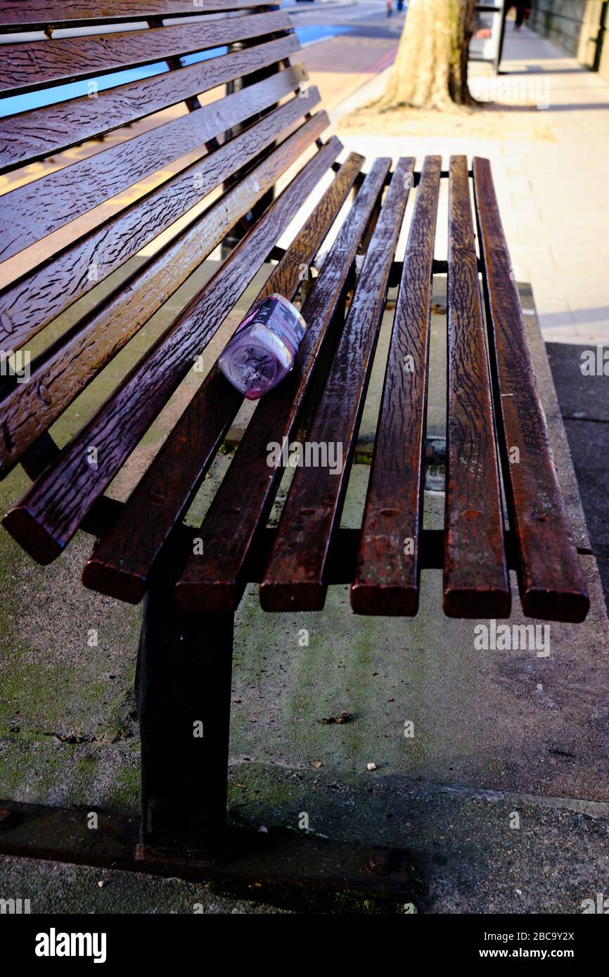 Perspective view of Plastic bottle on a bench Stock Photo - Alamy