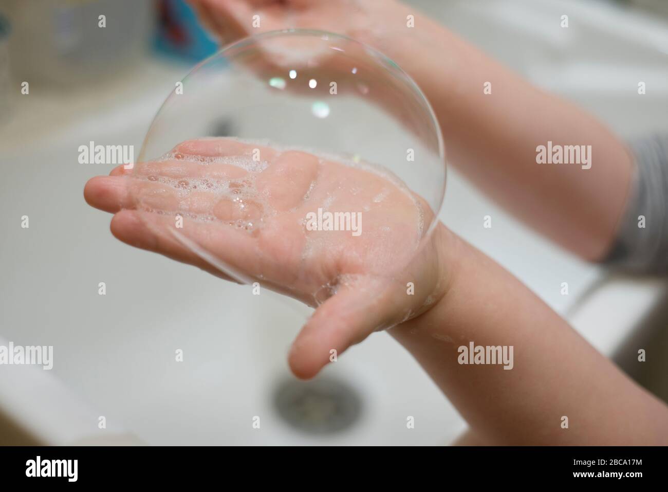 Holding bubble hi-res stock photography and images - Alamy