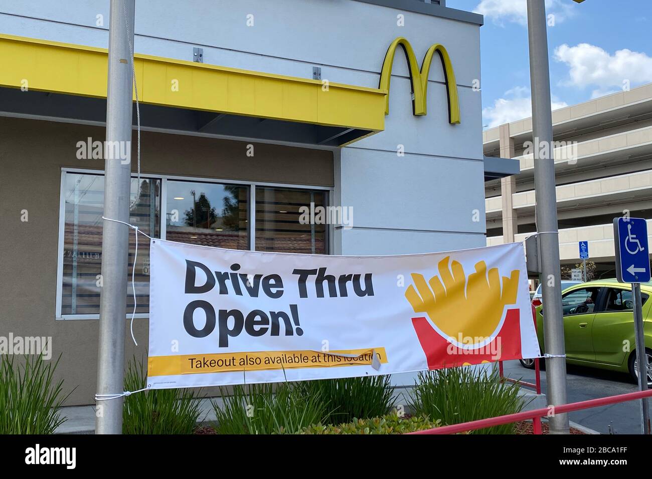 Drive thru open sign at McDonald's restaurant amid the global ...