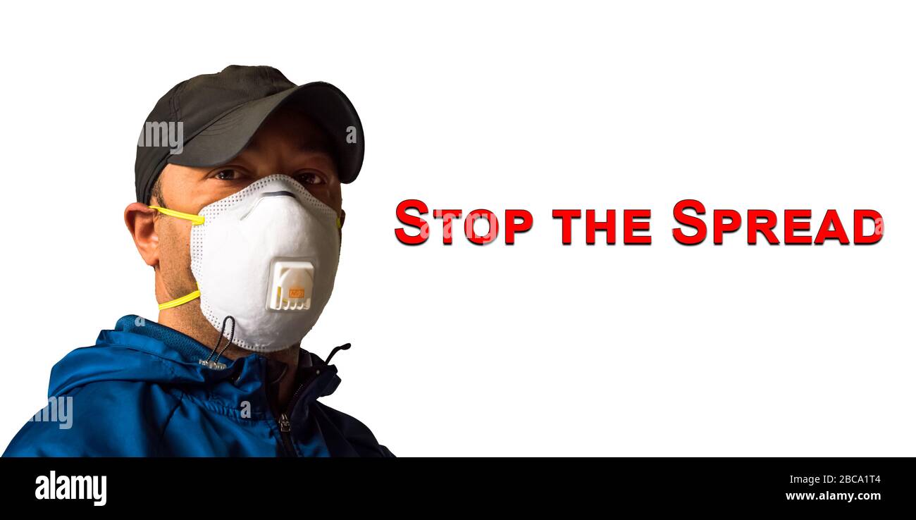 An adult male worker is wearing an N95 respirator mask with the message ...
