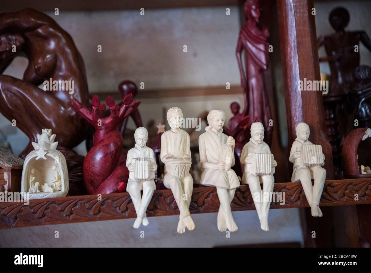 Africa, Madagascar, Ambositra city. Men making wooden handicrafts. The ...