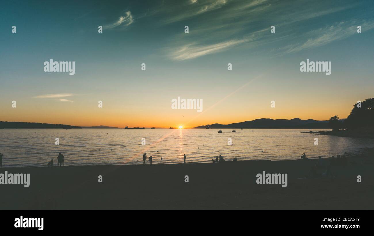 Summer sunset in British Columbia Canada. English Bay is the most ...