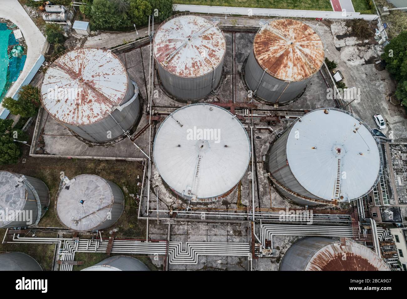 Aerial view of the pipelines and storage tanks Stock Photo - Alamy