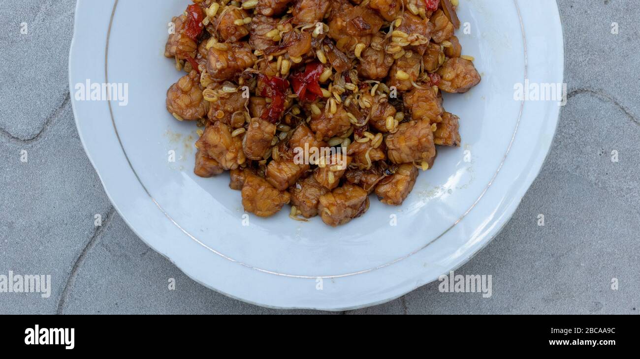 Tempe manis with chili sauce is traditional indonesian culinary food ...