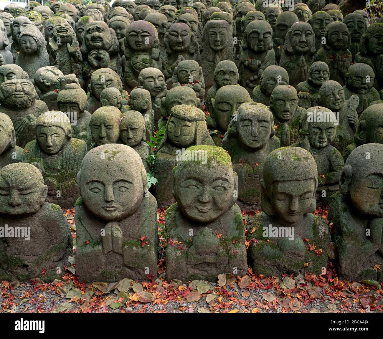 Row of ancient Rakan sculptures at Otagi Nenbutsu-ji Temple. Kyoto ...