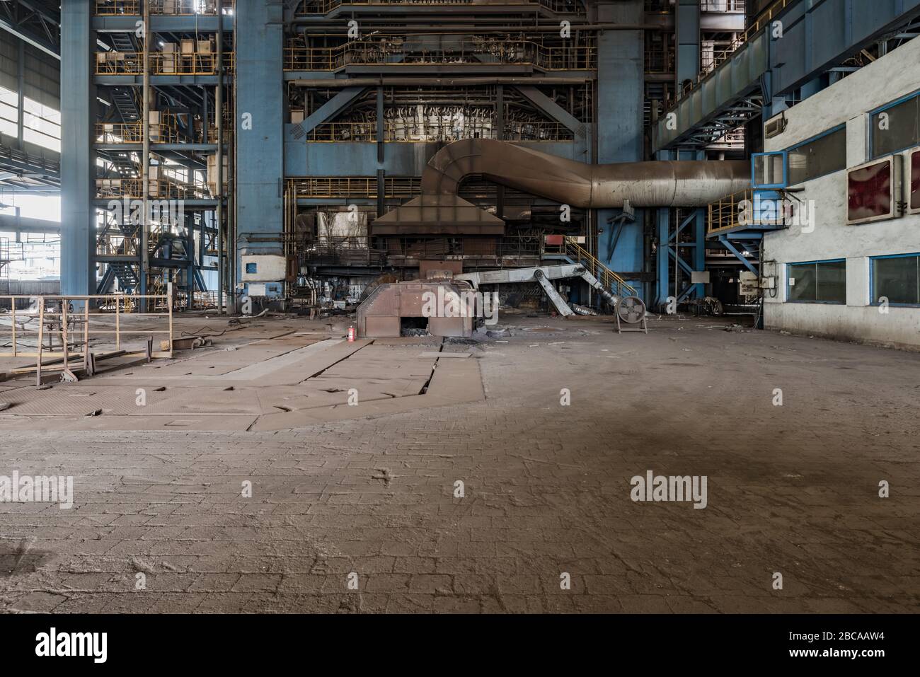 Interior of an old abandoned industrial steel factory Stock Photo - Alamy