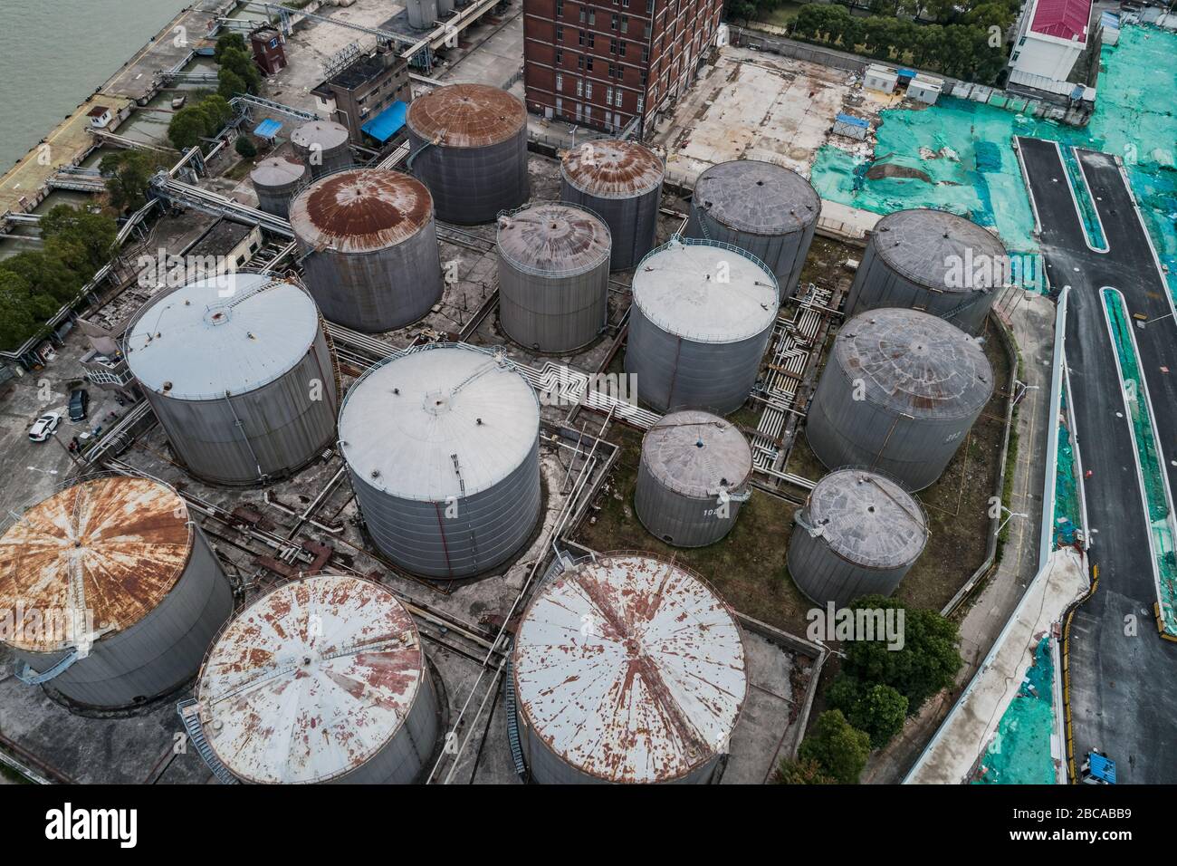 Aerial view of the pipelines and storage tanks Stock Photo - Alamy