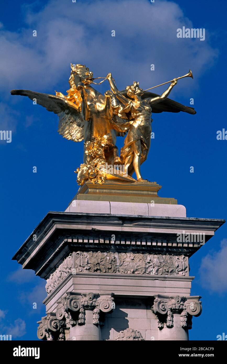 Gilded statues of Fames on top of the pillars of Pont Alexandre III ...
