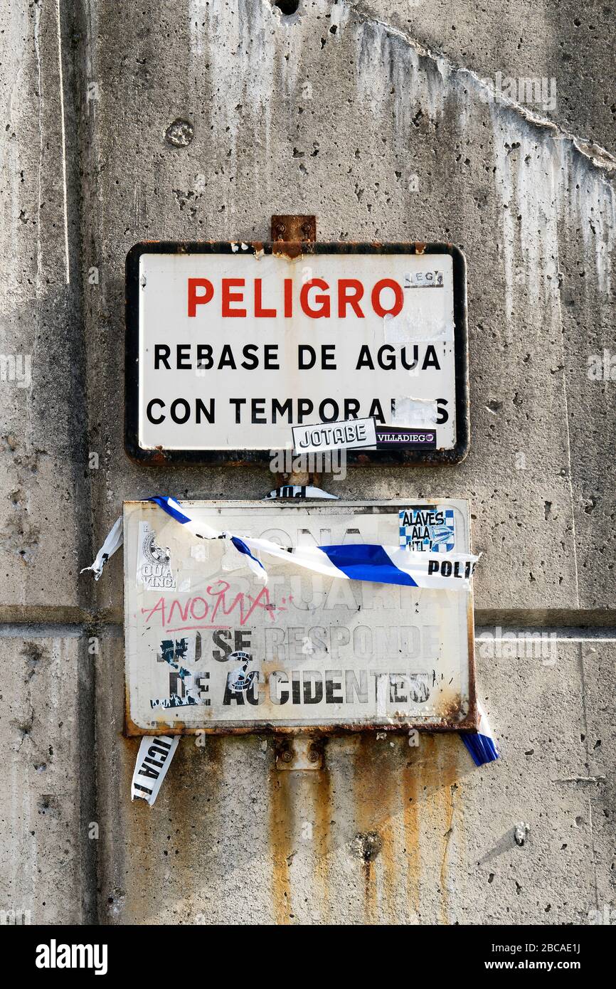 Spain, Asturias, Llanes, port, warning signs Stock Photo - Alamy