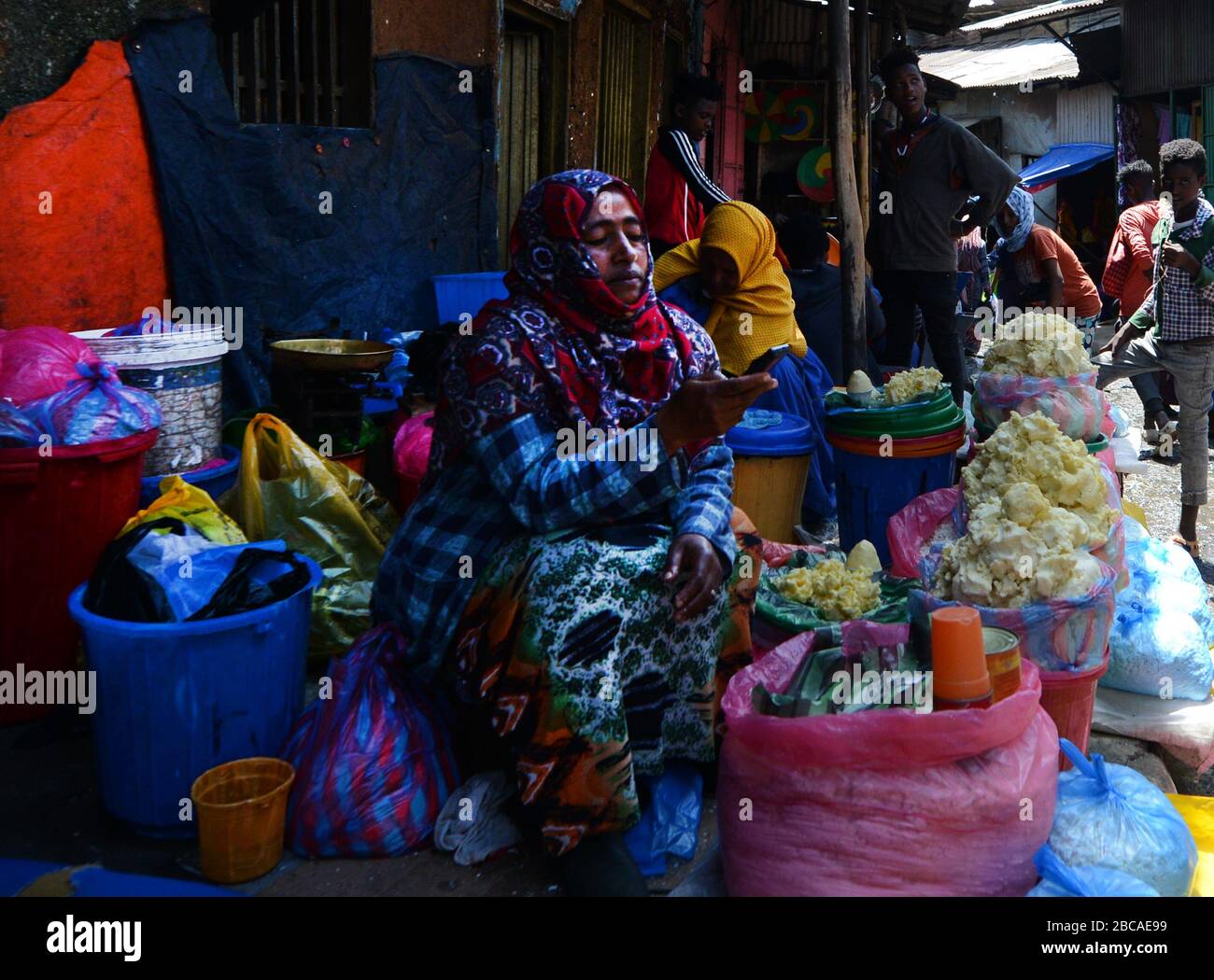 Ethiopian women selling butter at the Mercato market in Addis Ababa ...