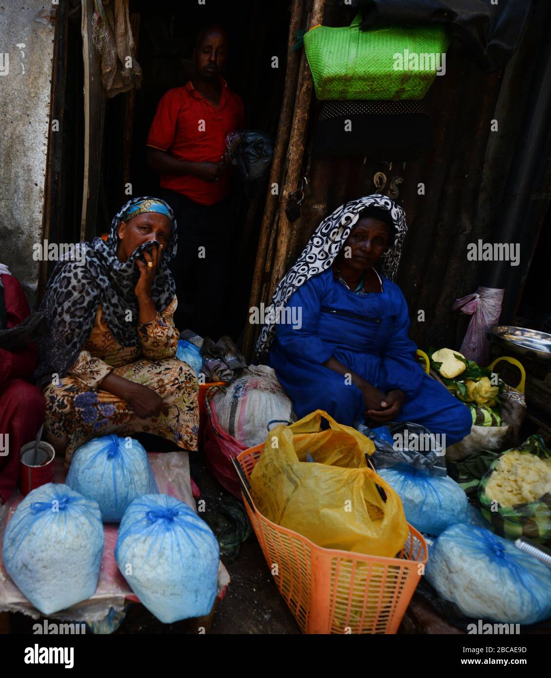 Ethiopian women selling butter at the Mercato market in Addis Ababa ...