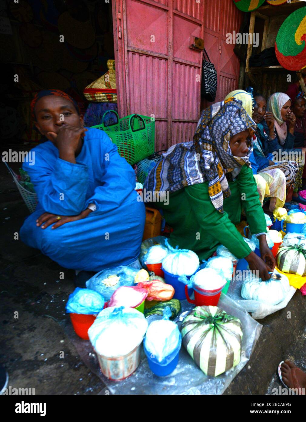 Ethiopian women selling butter at the Mercato market in Addis Ababa ...