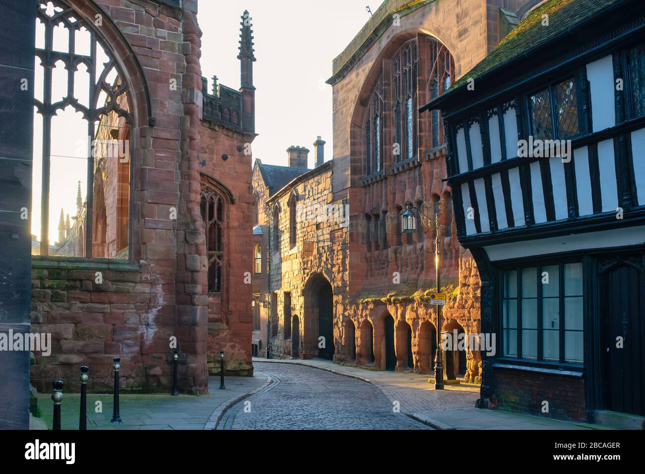 Old Coventry Cathedral and Bayley Lane just after sunrise in the spring ...