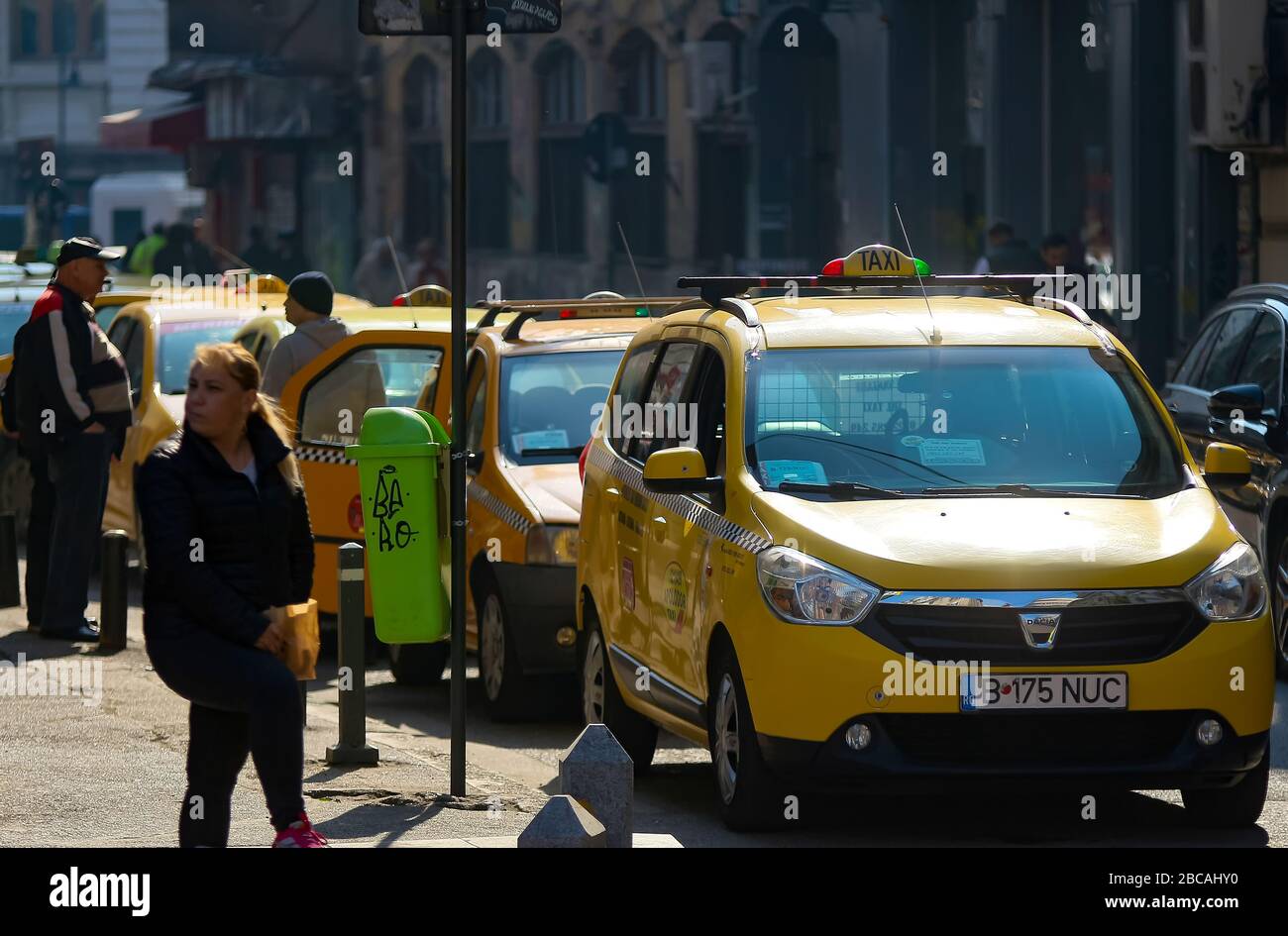 Bucharest, Romania - February 20, 2019: Yellow taxi cabs are parked in ...
