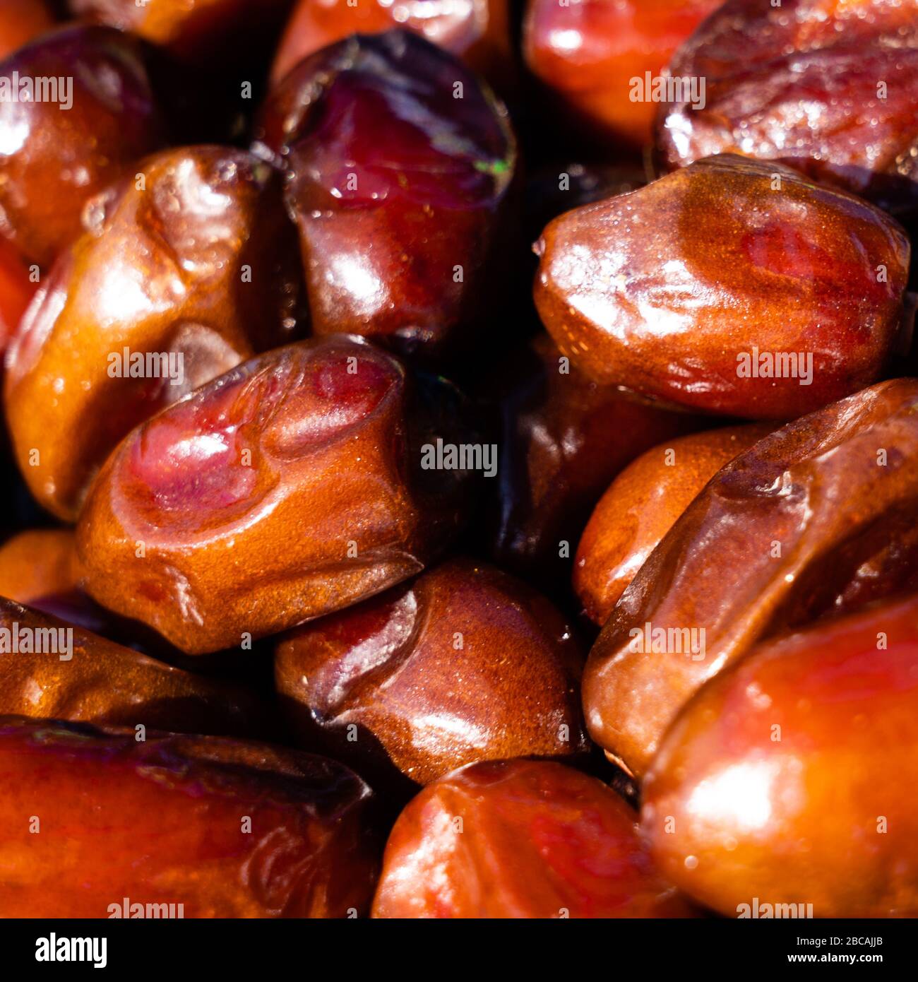 Dried dates ,macro shot , focus on a center Stock Photo - Alamy