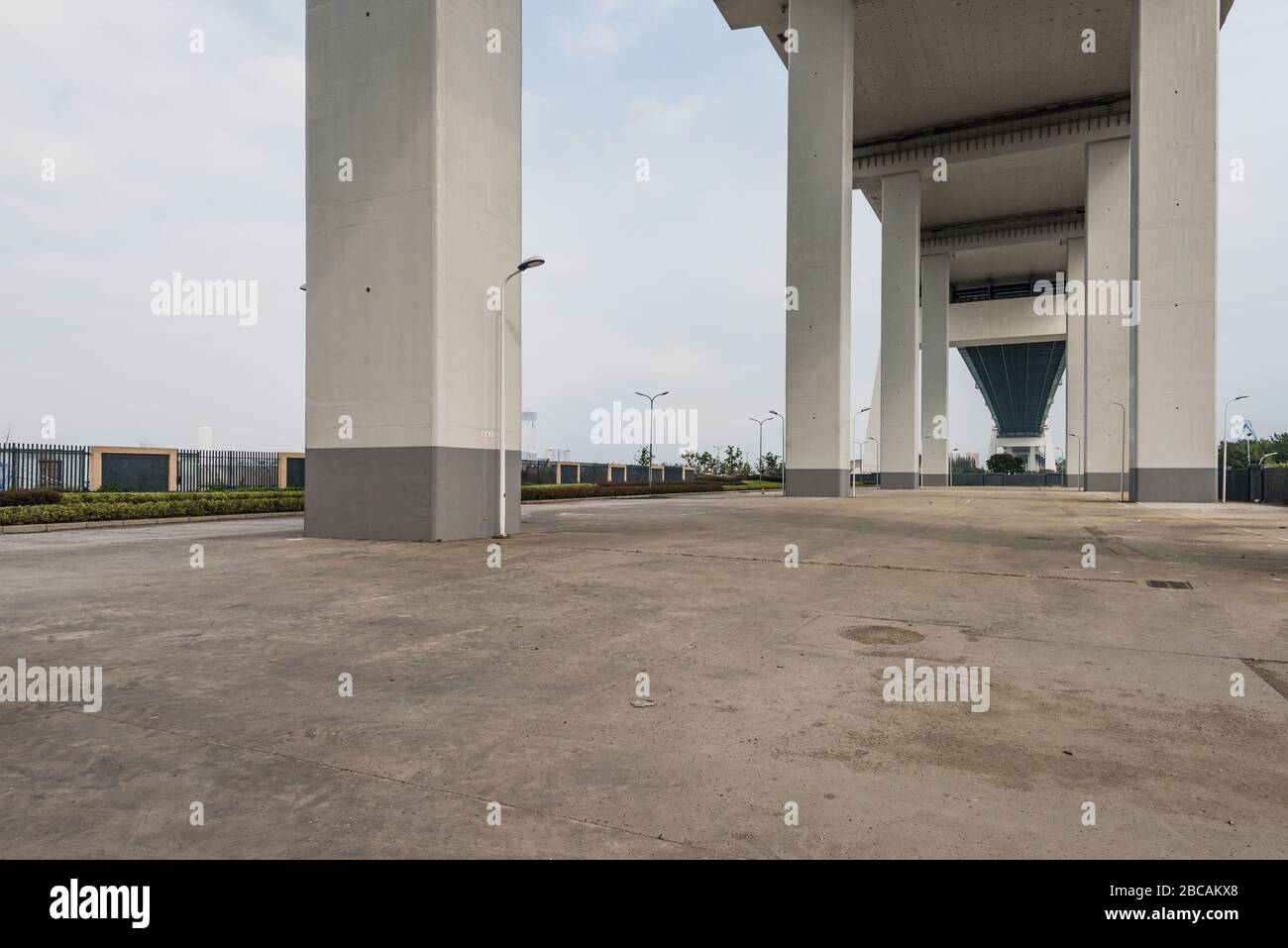 Under the pier at concrete ground Stock Photo - Alamy