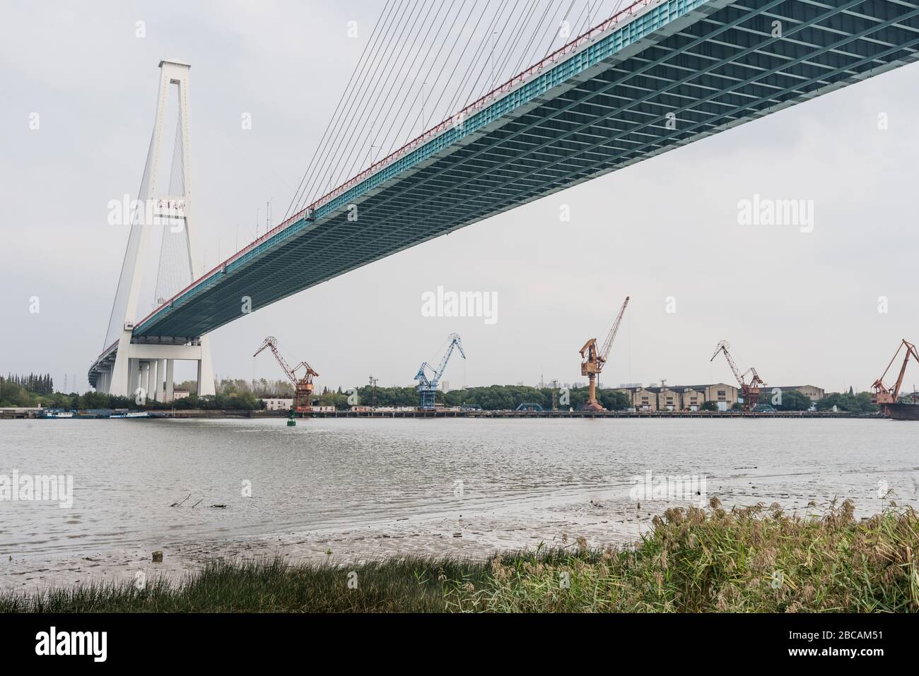 Xupu bridge, Shanghai, China. the Chinese characters on the bridge is ...