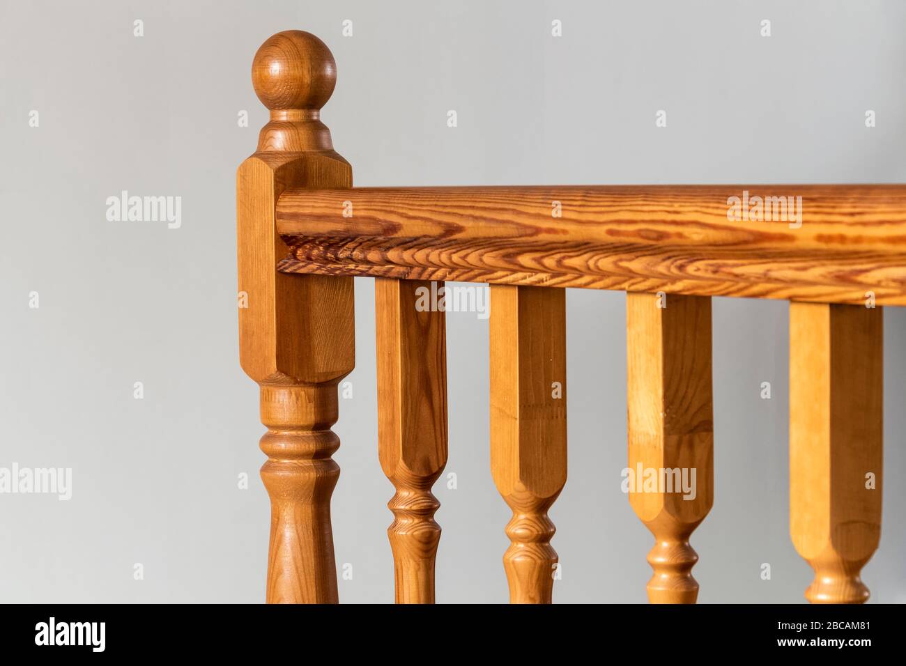 Element of a wooden interior staircase. Wooden baluster close-up Stock ...