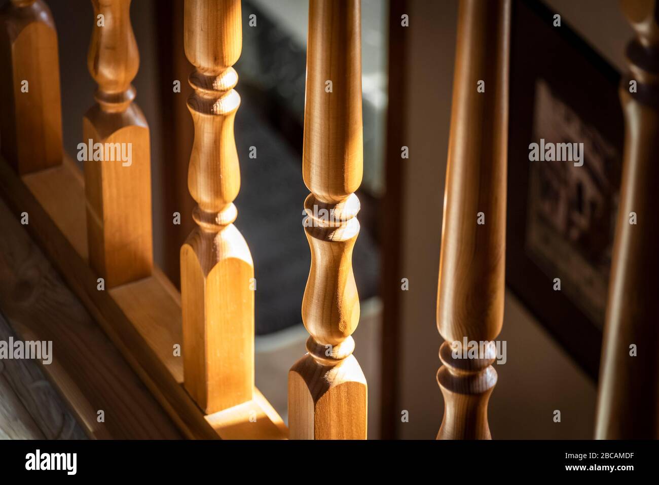 Element of a wooden interior staircase. Wooden baluster close-up Stock ...