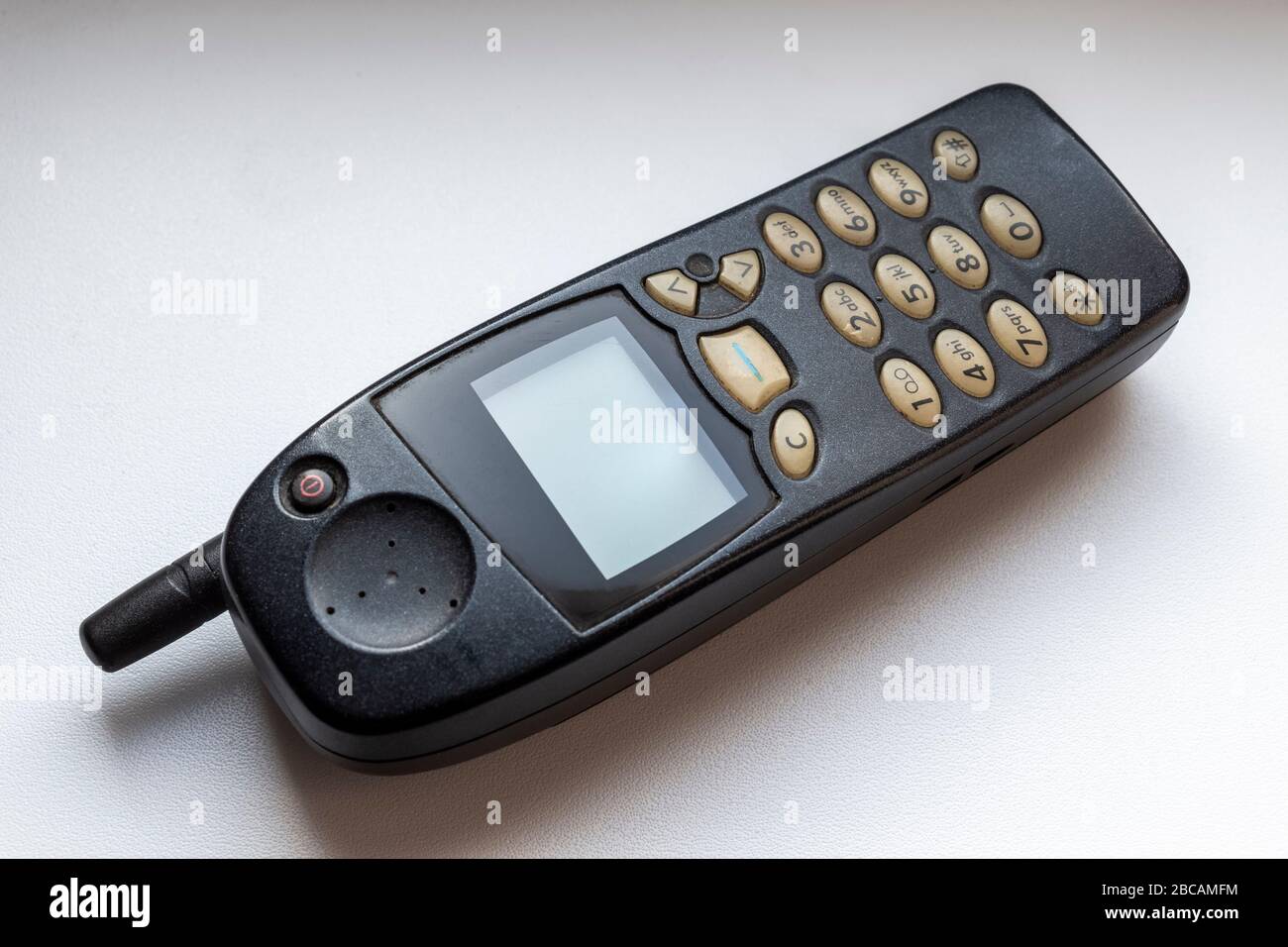 Old cellular push-button telephone close-up on a white windowsill Stock ...