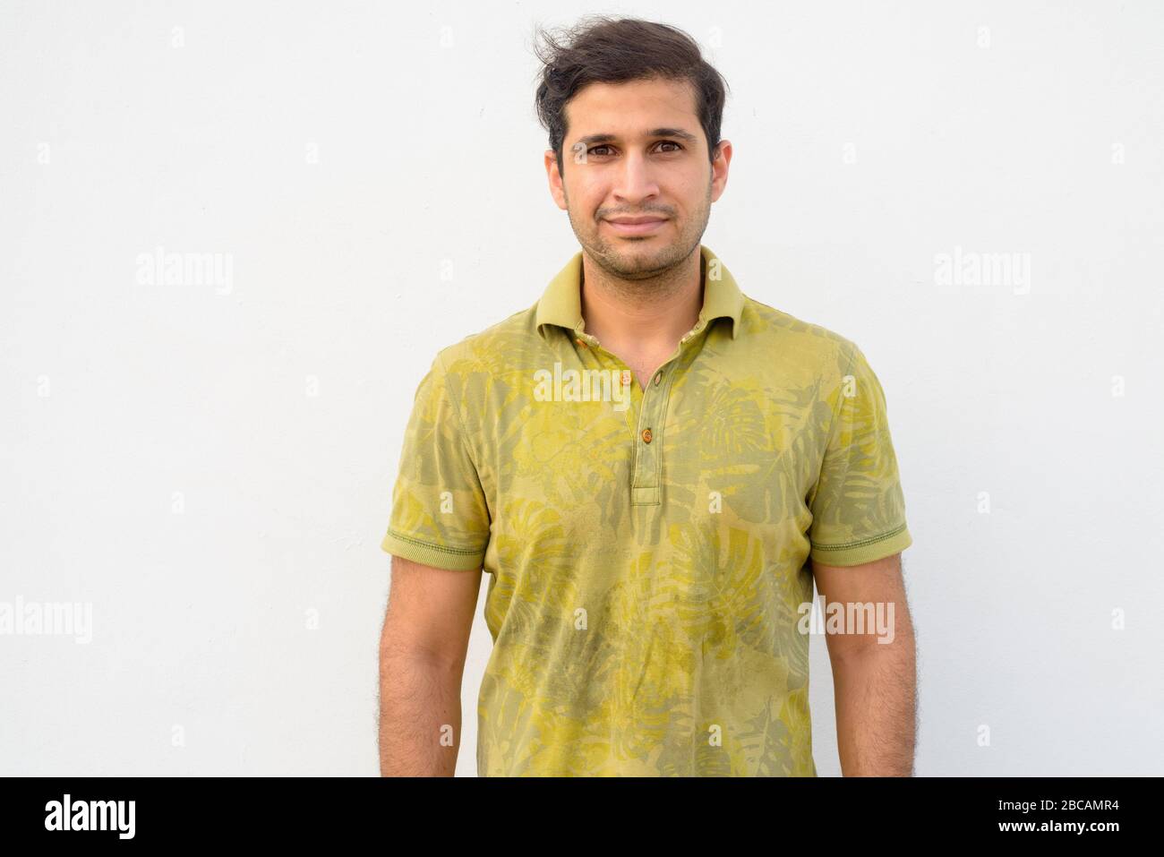 Portrait of young handsome Iranian man against white background Stock ...