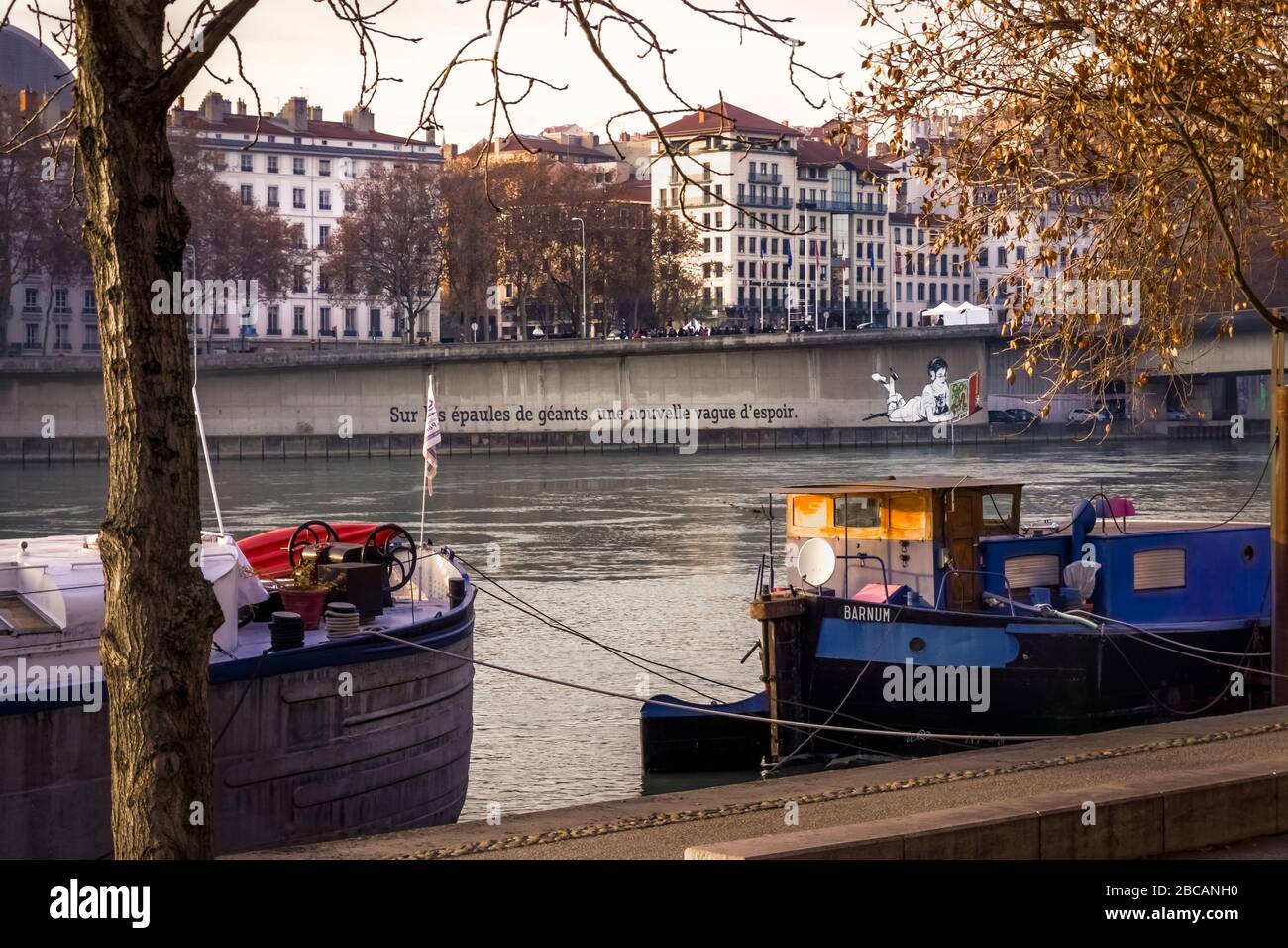 Barges at Quai Du Général Sarrail on the Rhone in Lyon in autumn. Lyon ...