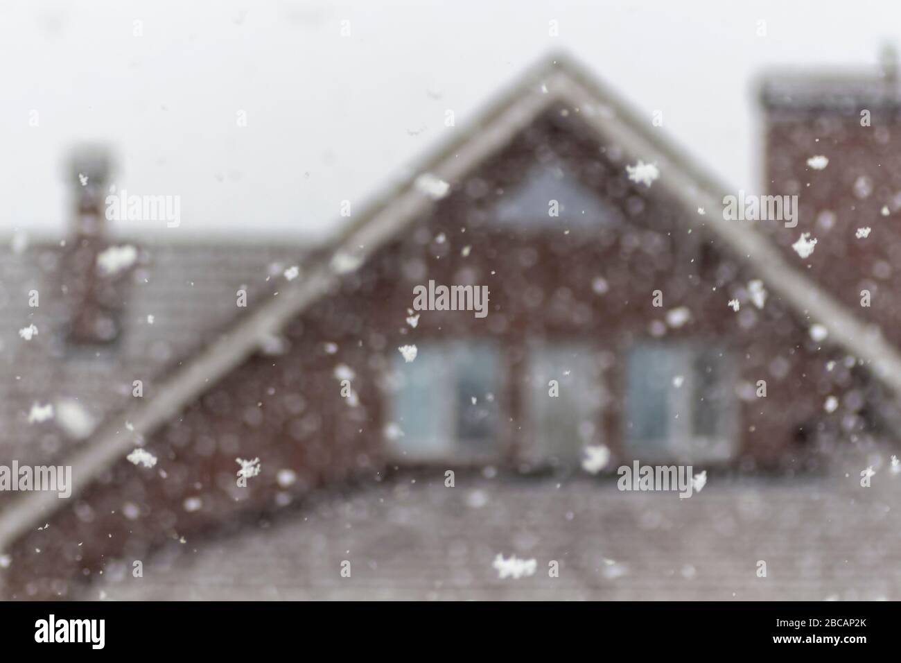 There is heavy snow outside the window Stock Photo - Alamy