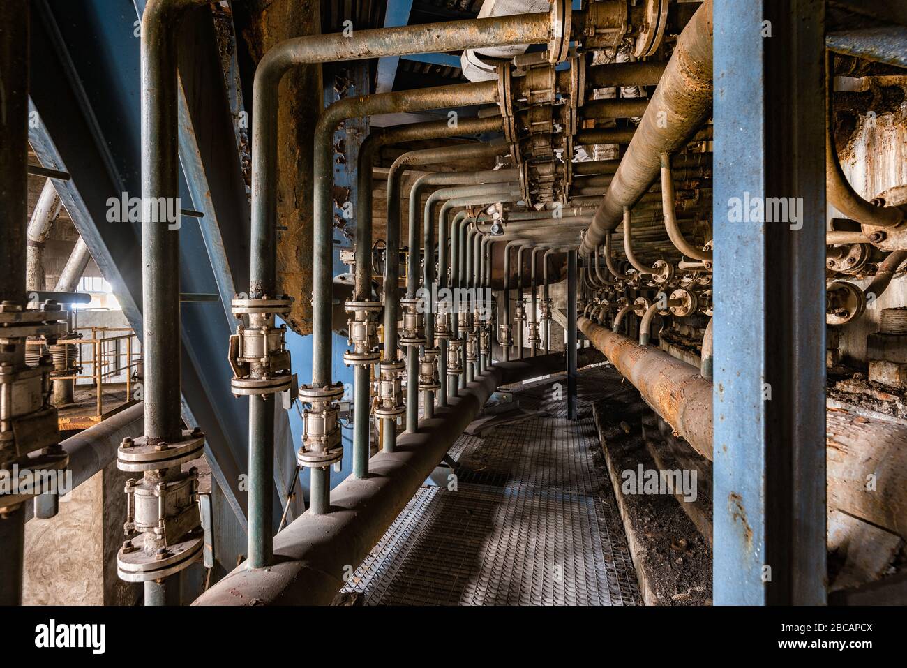 Interior of an old abandoned industrial steel factory Stock Photo - Alamy