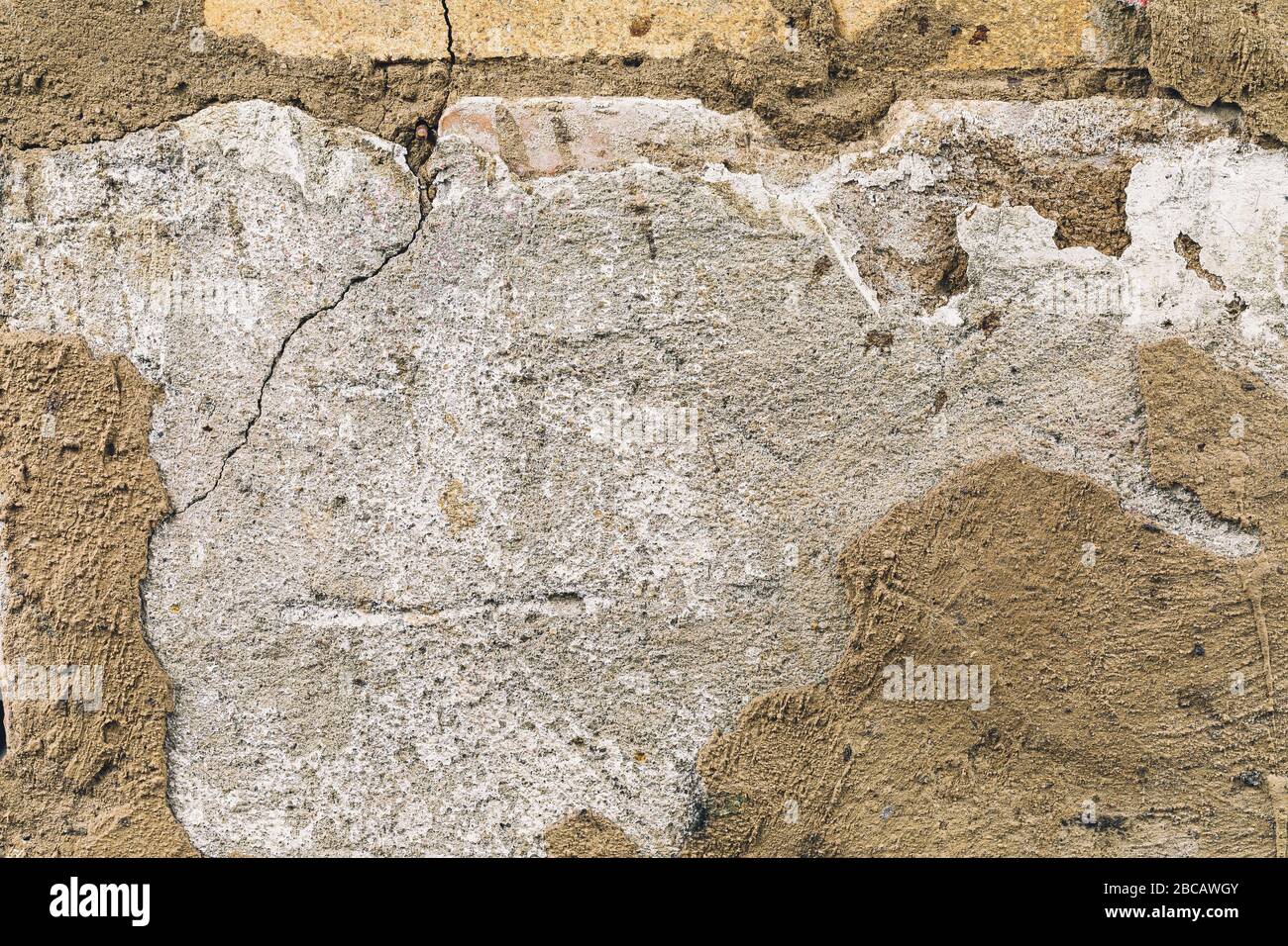 Texture of a brick wall with fallen stucco Stock Photo - Alamy