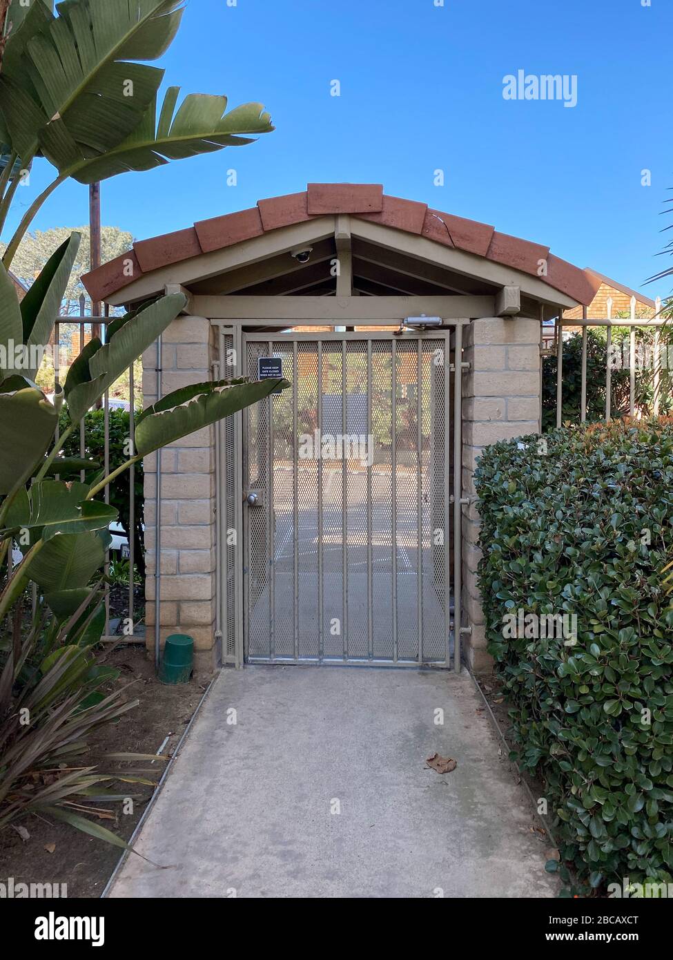 Gate door entrance of typical condo complex community. in Solana Beach ...