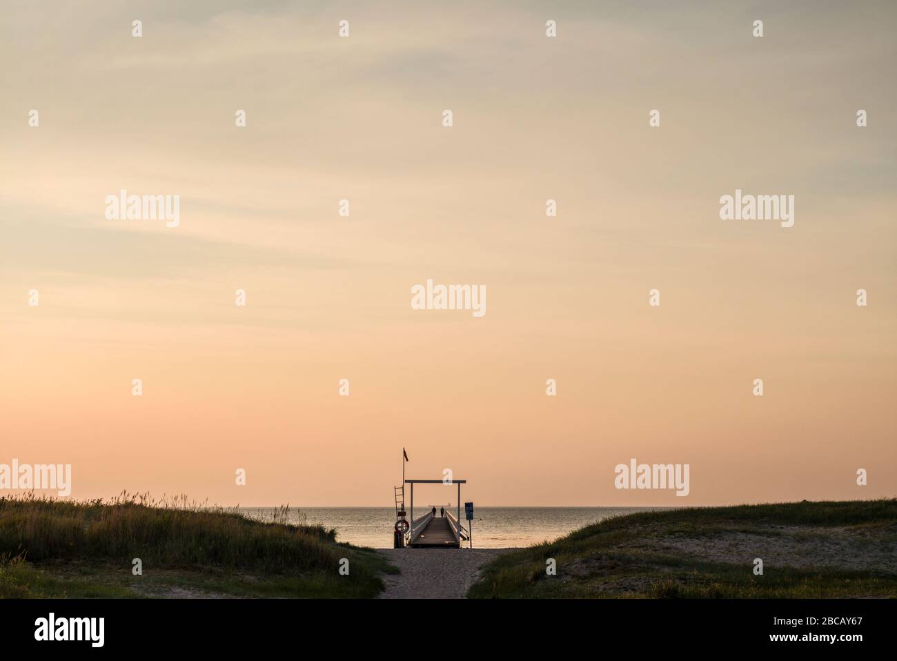 Sweden, Scania, Malmo, Riberborgs Stranden beach area, pier at sunset ...
