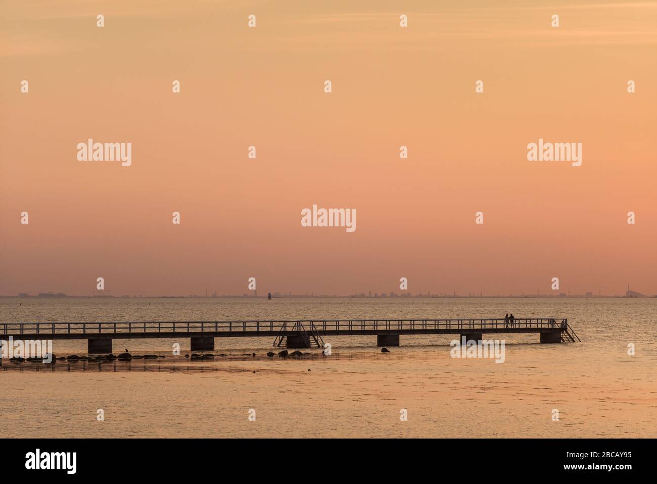 Sweden, Scania, Malmo, Riberborgs Stranden beach area, pier at sunset ...