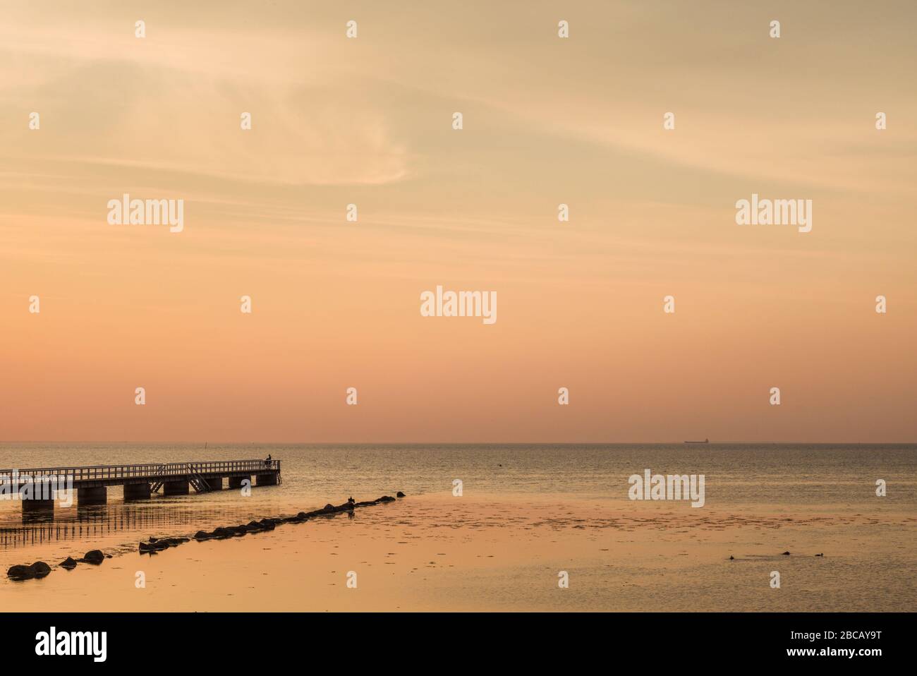 Sweden, Scania, Malmo, Riberborgs Stranden beach area, pier at sunset ...