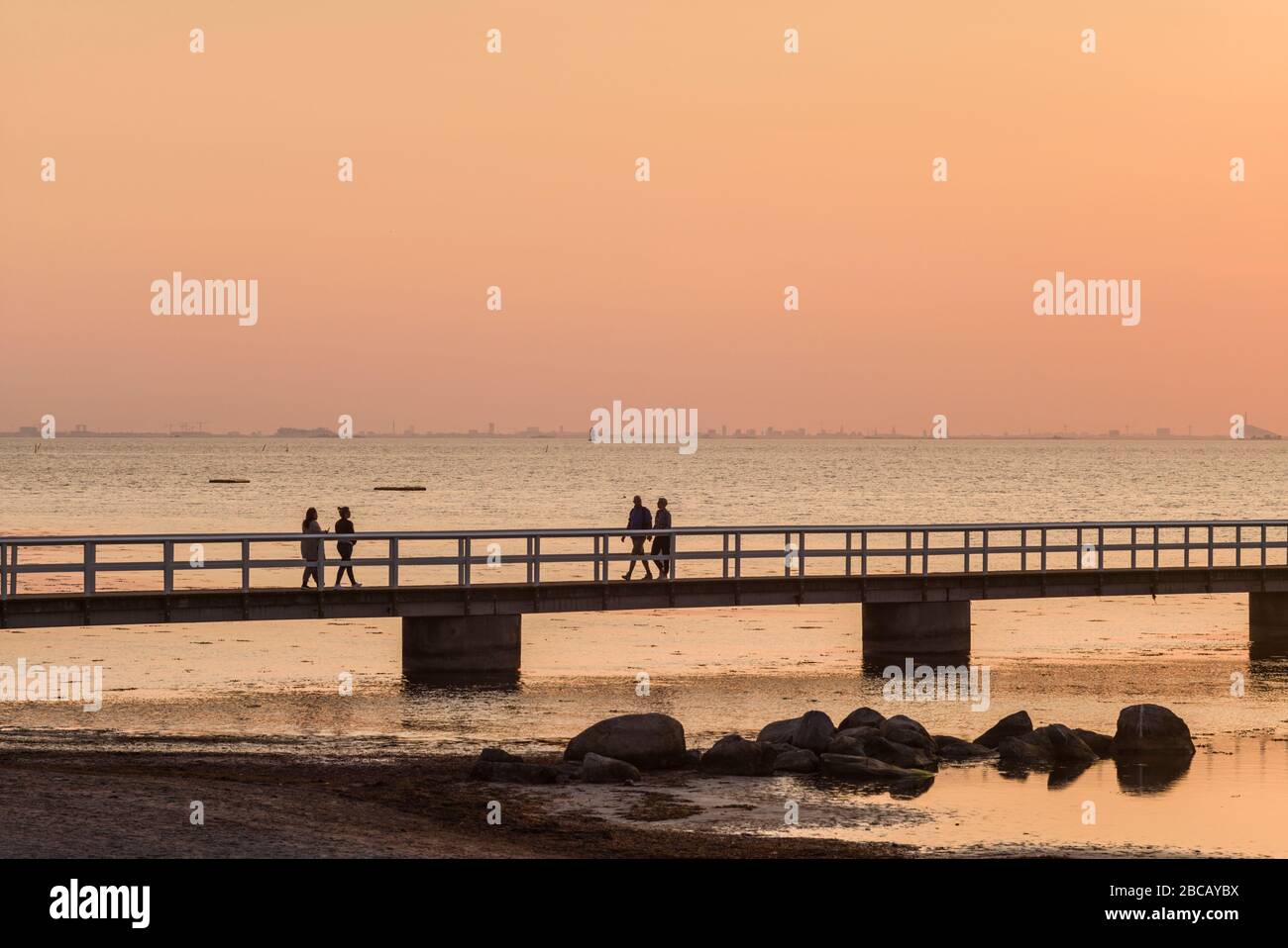 Sweden, Scania, Malmo, Riberborgs Stranden beach area, pier at sunset ...