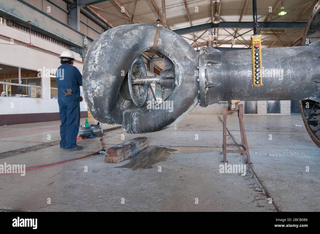 The industrial vertical water pump in a mechanical workshop ready for ...