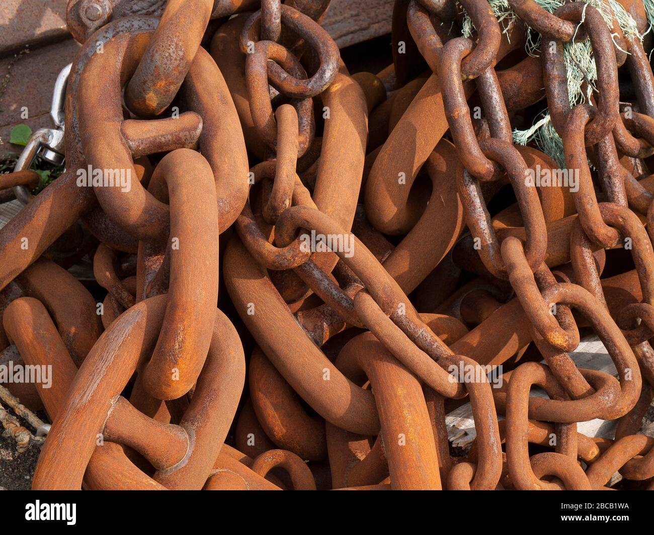 Rusty chain, part of a fishing equipment in the Port of Gilleleje ...