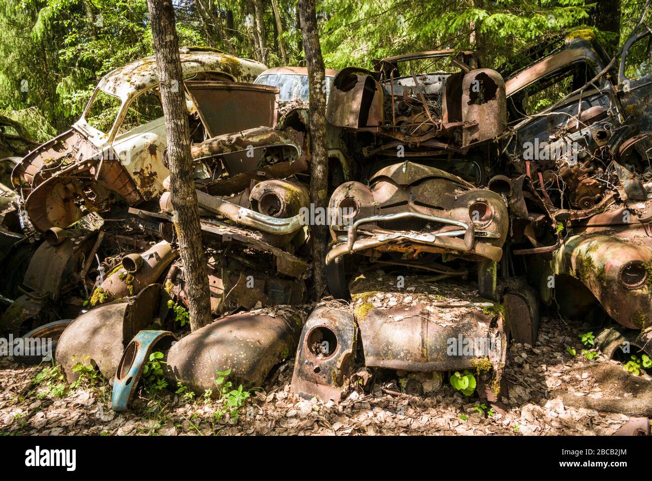 Sweden, Varmland, Bastnas, Bastnas Car Cemetery public park, antique car junkyard Stock Photo ...