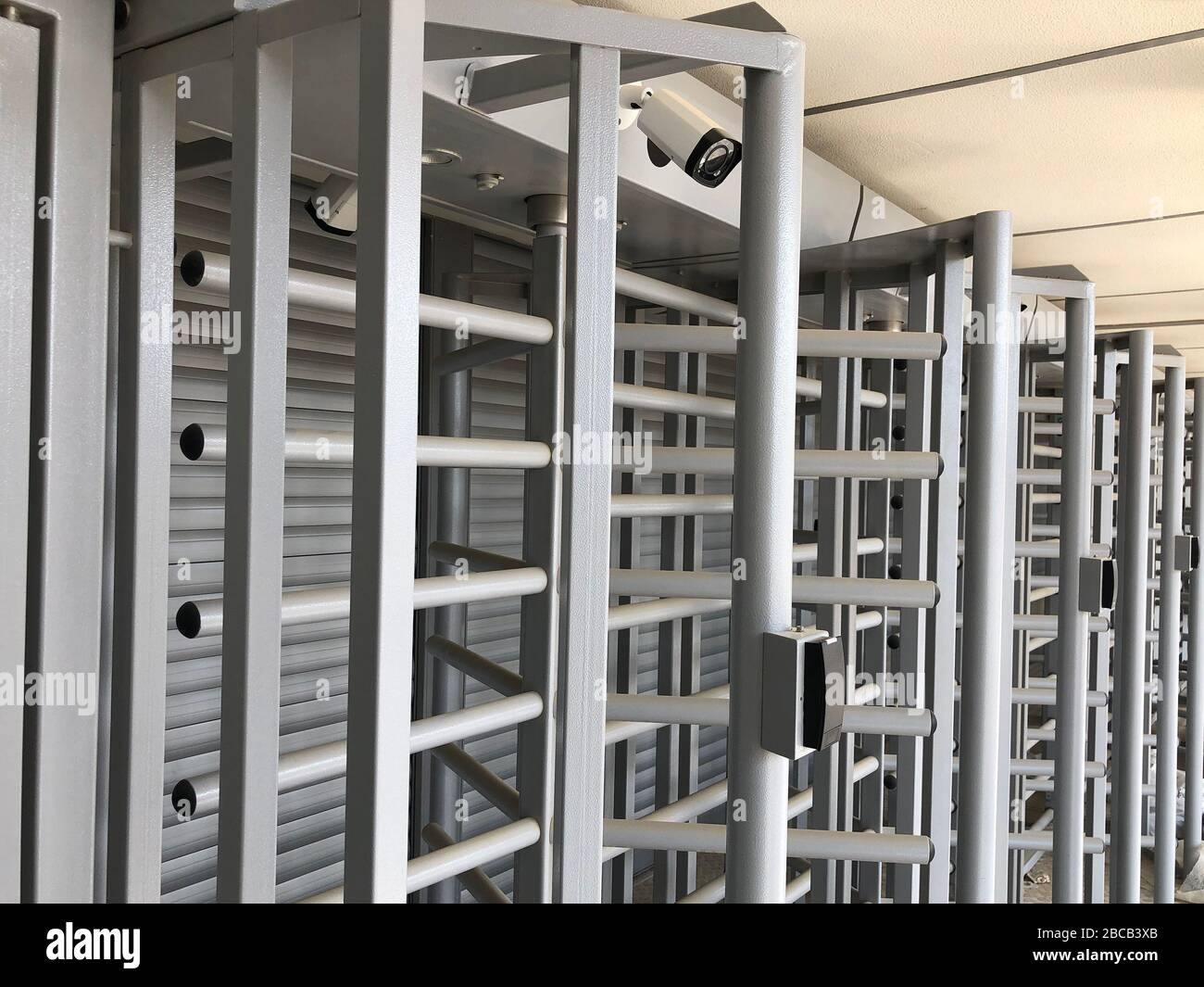 brand new closed turnstiles with ip cameras Stock Photo - Alamy