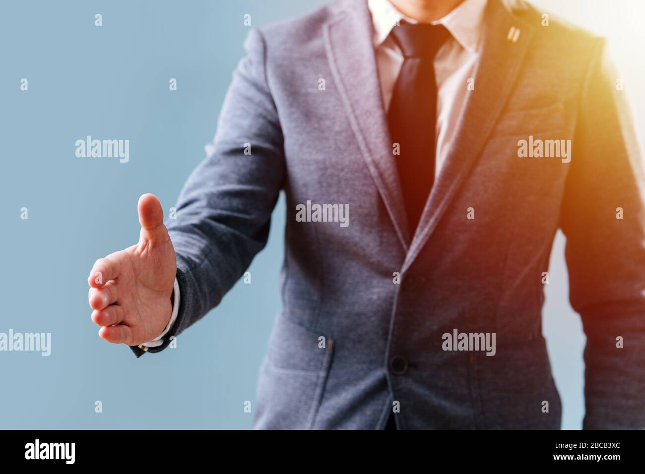 Man reaches out hand sun hi-res stock photography and images - Alamy