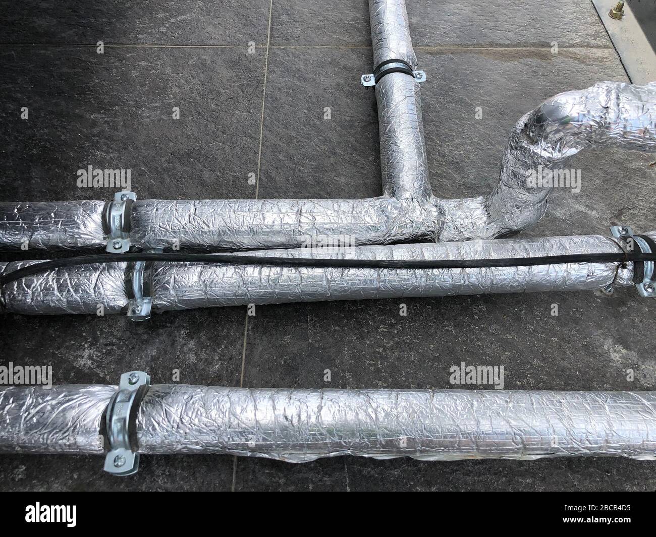 thermally insulated water pipes on the pipeline Stock Photo - Alamy