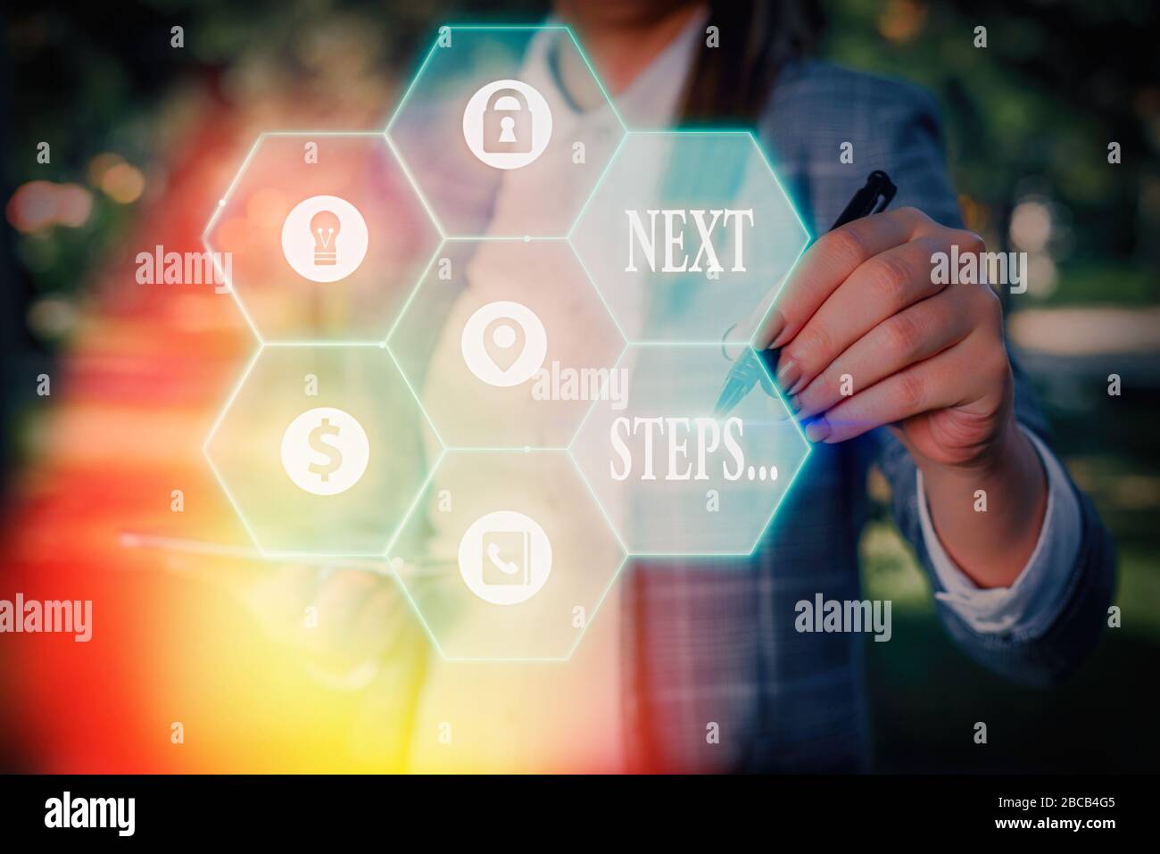 Writing note showing Next Steps. Business concept for something you do ...