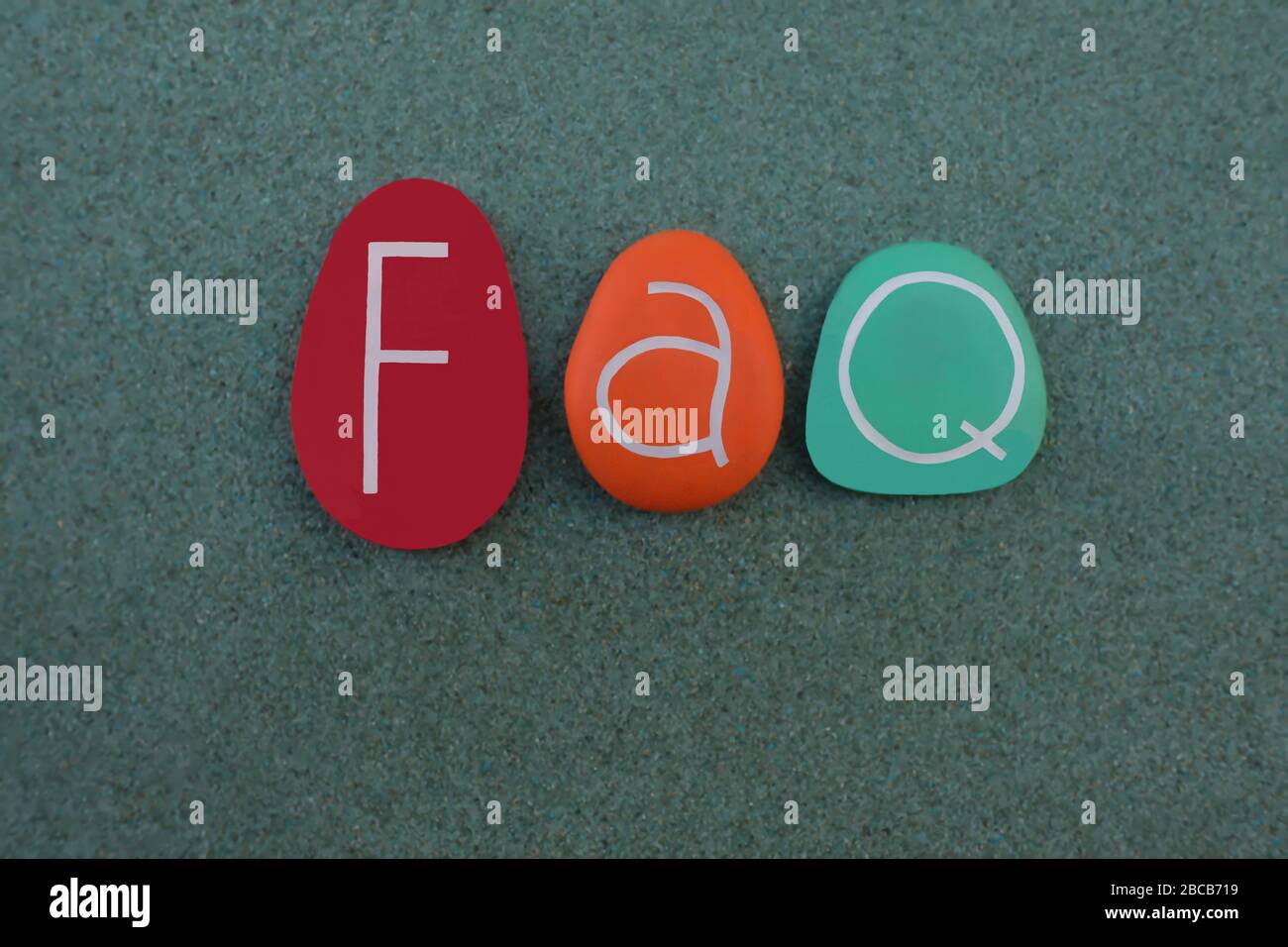 FAQ, Frequently Asket Question text composed with colored stone letters ...