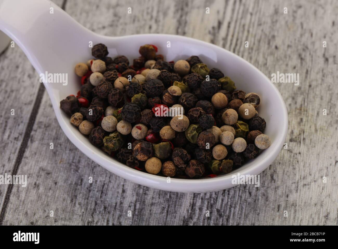 Pepper corn mix - black, red, white and green Stock Photo - Alamy